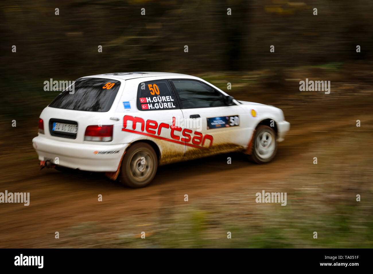 KOCAELI, TURKEY - NOVEMBER 17, 2018: Hakan Gurel drives Suzuki Baleno ...