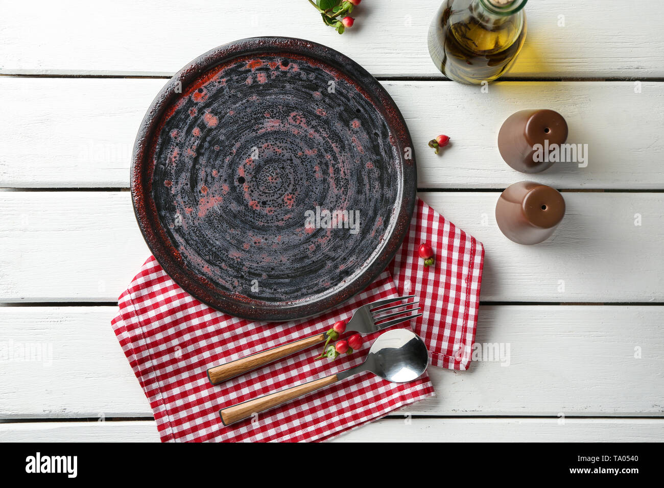 Beautiful table setting with stylish plate Stock Photo - Alamy