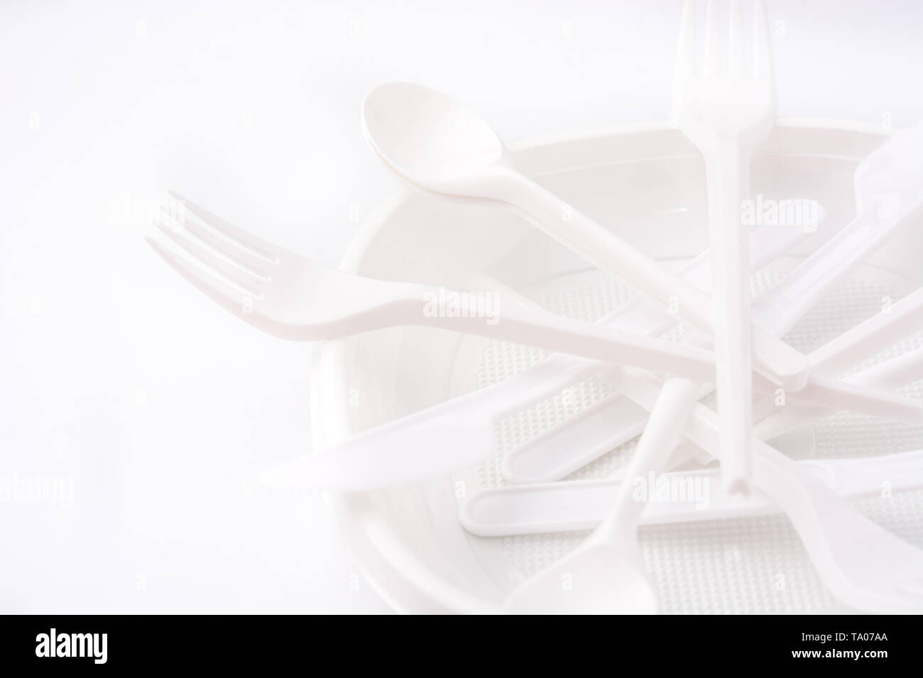 Disposable plastic crockery isolated on white background Stock Photo ...