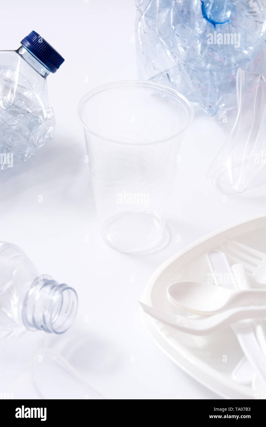 Disposable waste plastic isolated on white background Stock Photo - Alamy