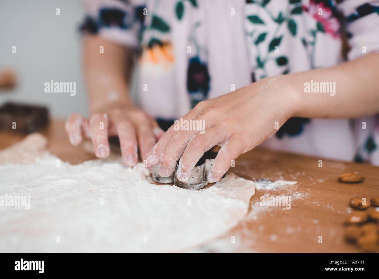 Little girl making cookies closeup. Childhood Stock Photo - Alamy