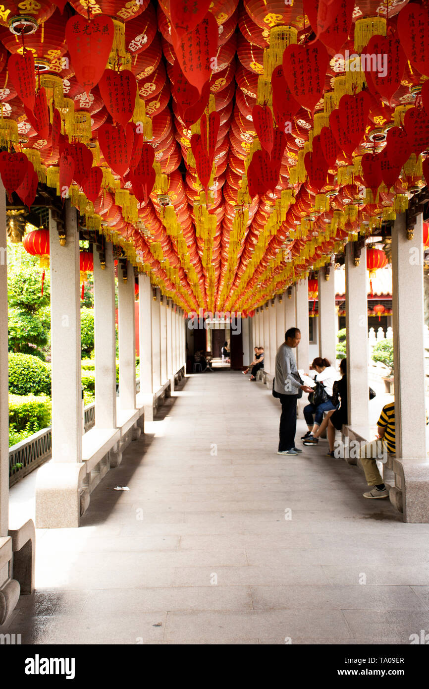 Chinese people and foreigner travelers travel relax sitting on pathway ...