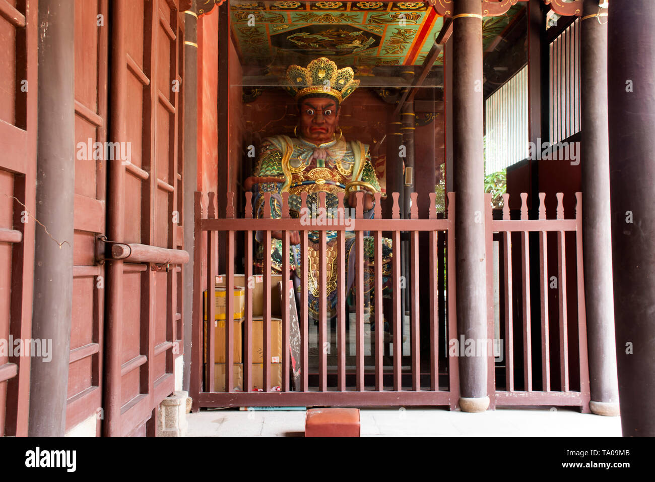 Chinese angel warrior door keeper statue at gate of Tiantan temple at ...