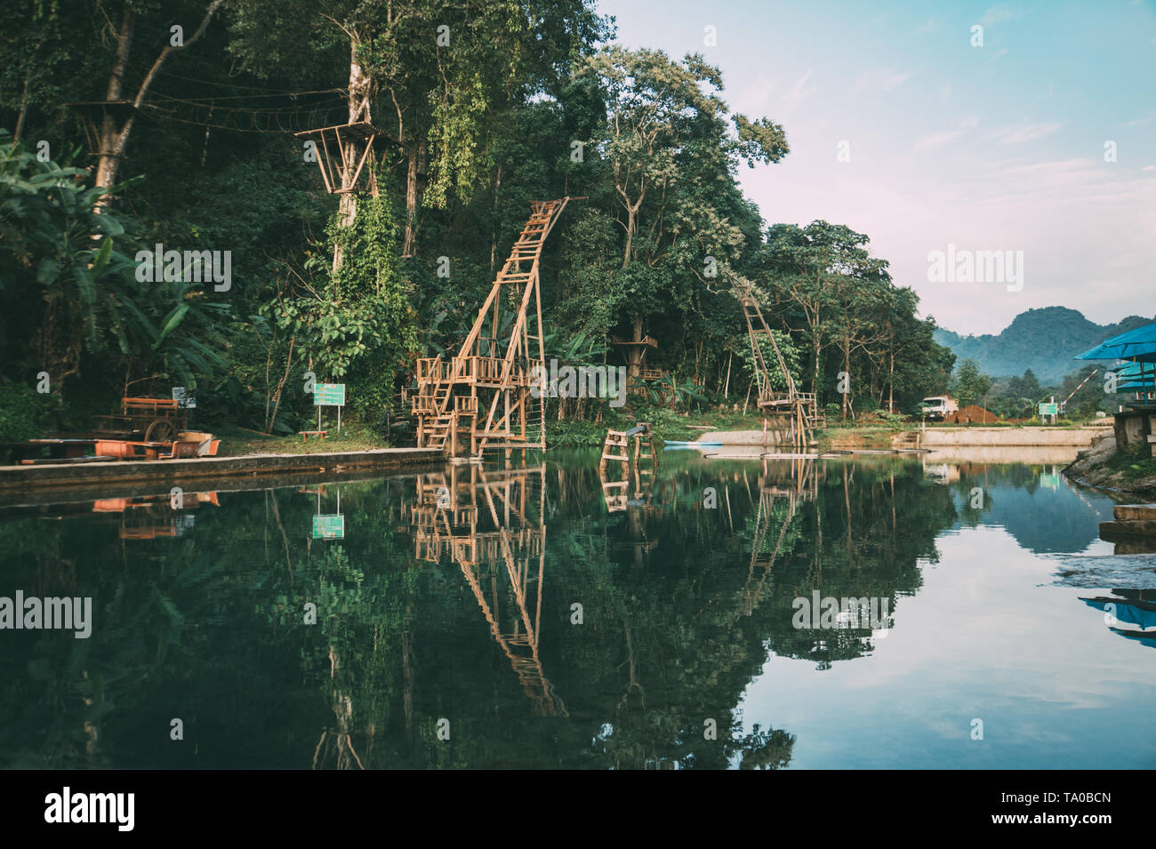 hidden blue lagoon lake near mountain in Vang Vieng, Laos. Clear clear ...