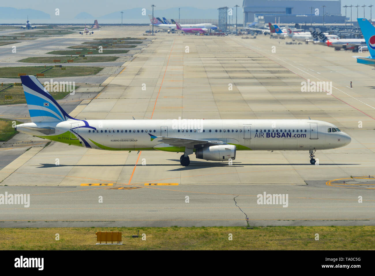 Osaka, Japan - Apr 18, 2019. HL7730 Air Busan Airbus A321 taxiing on ...