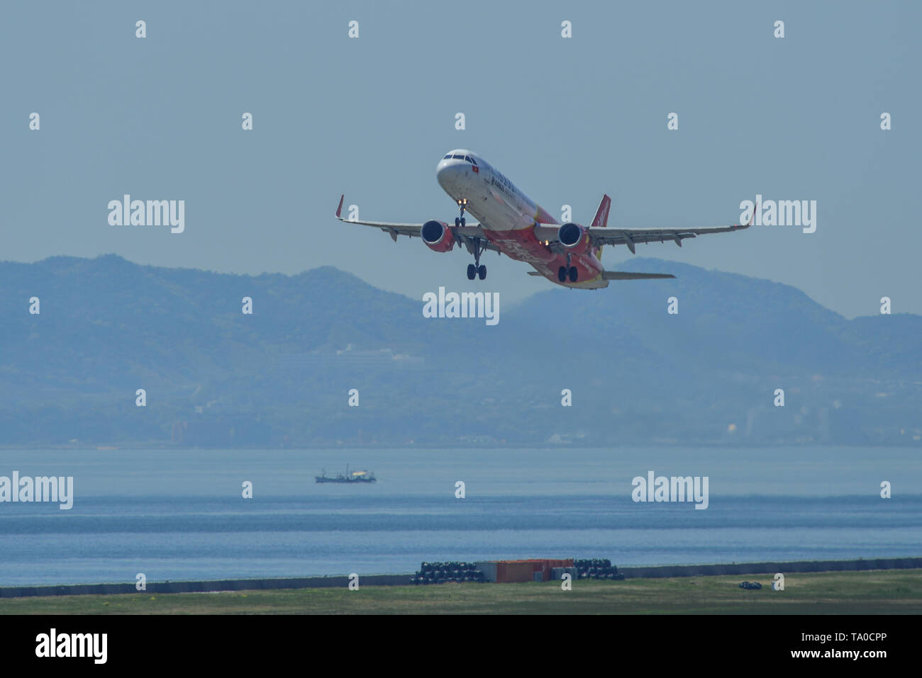 Osaka, Japan - Apr 18, 2019. VN-A651 VietJet Air Airbus A321 taking off ...
