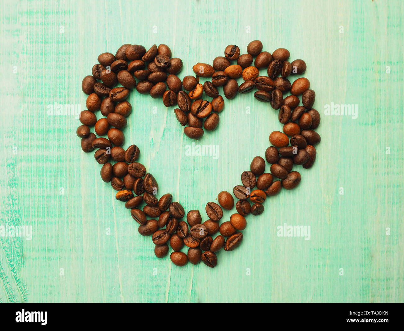 coffee beans on brown matter, the heart of the coffee beans, background ...