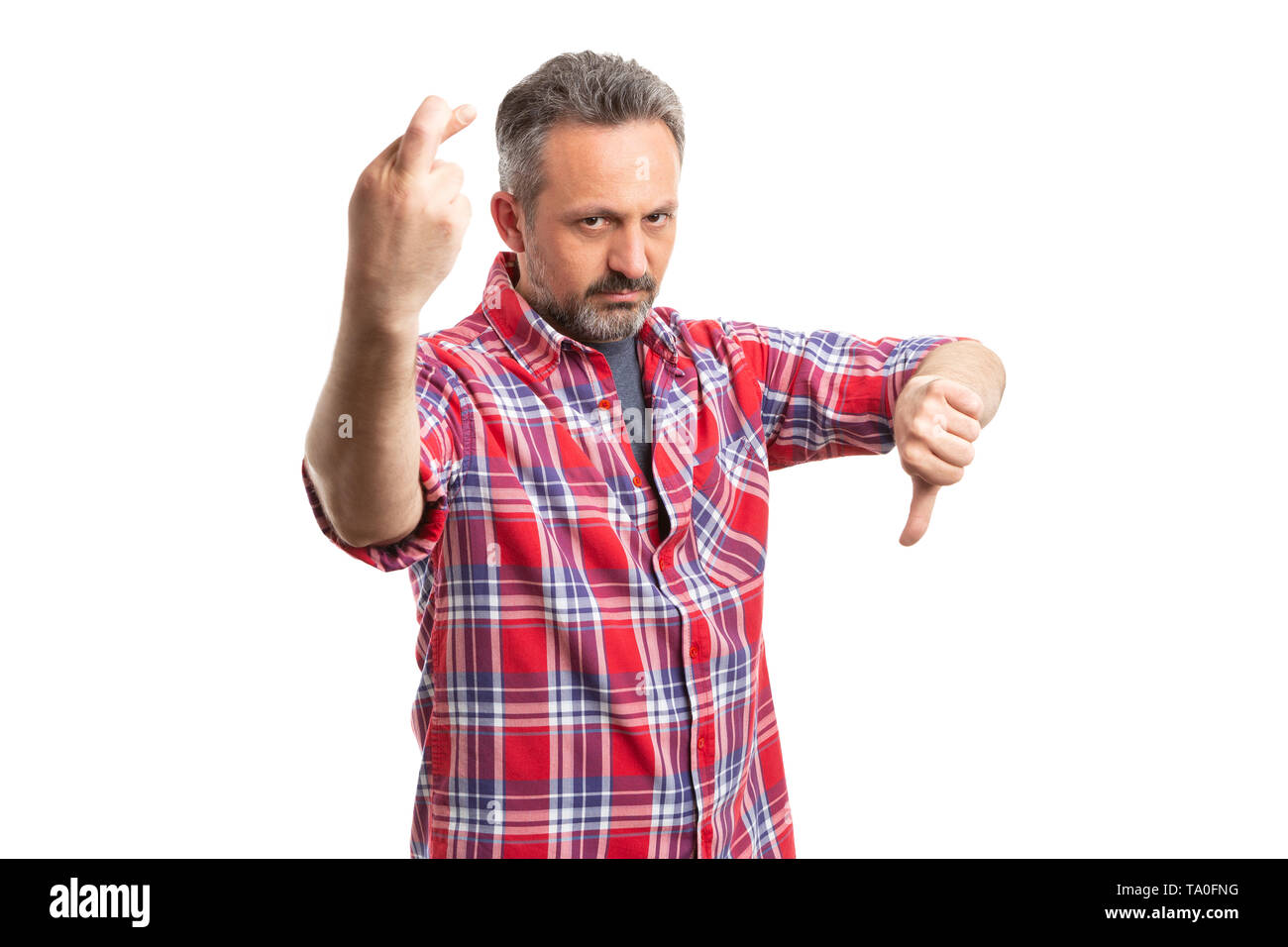 Angry man making bad luck and dislike gesture with crossed fingers ...