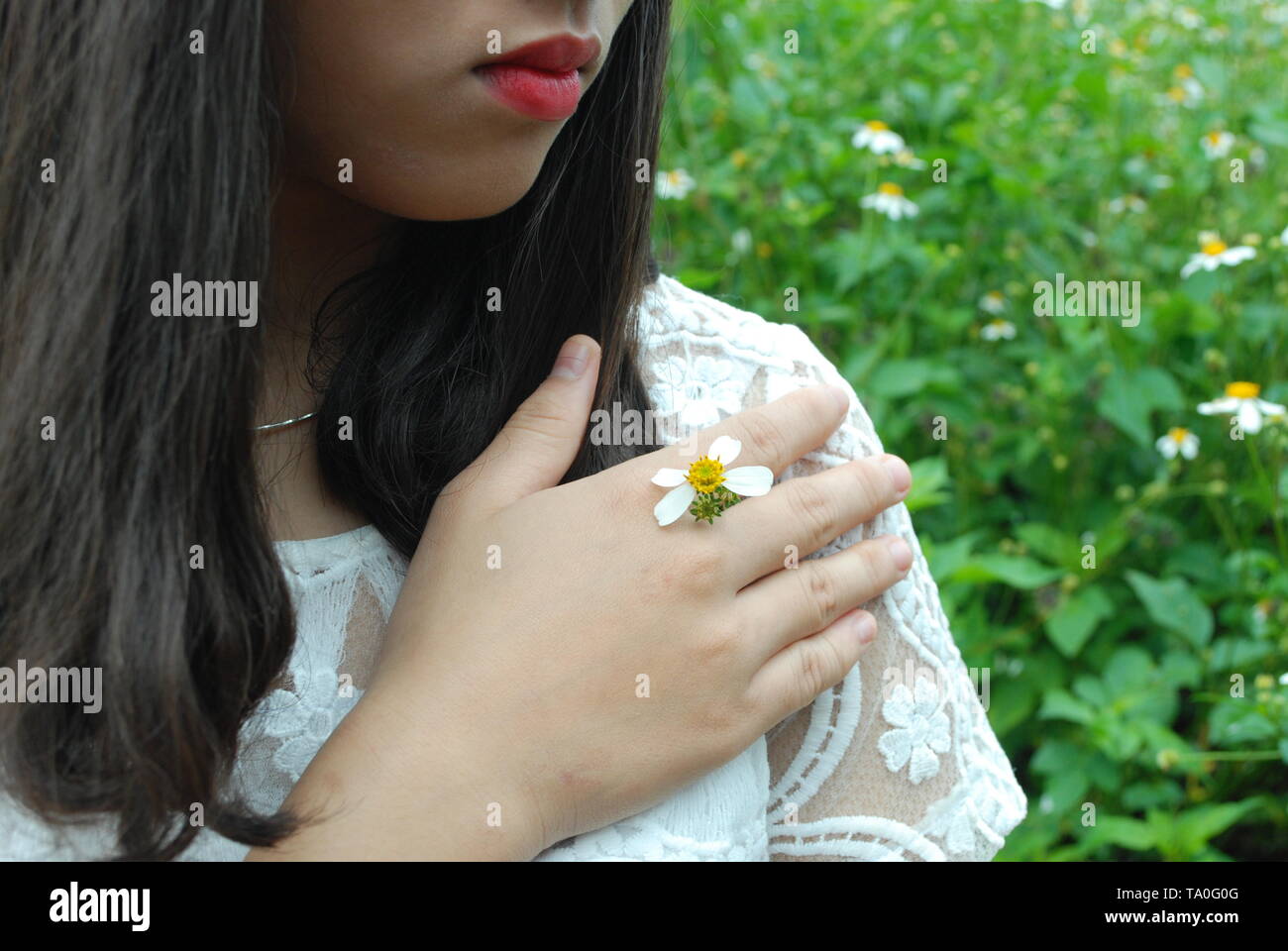 Flowers in girls hands hi-res stock photography and images - Alamy