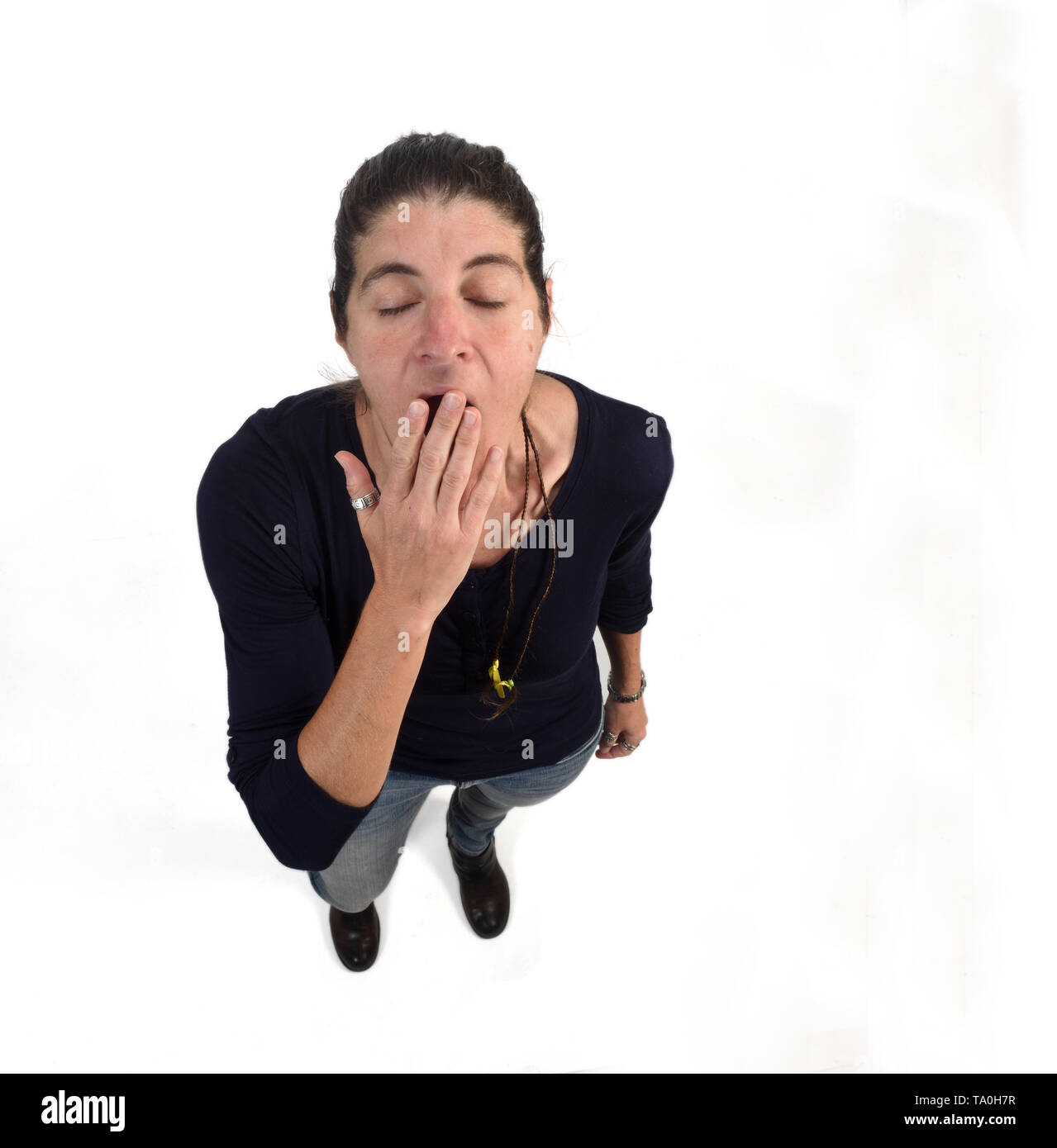 woman yawning on white background Stock Photo - Alamy