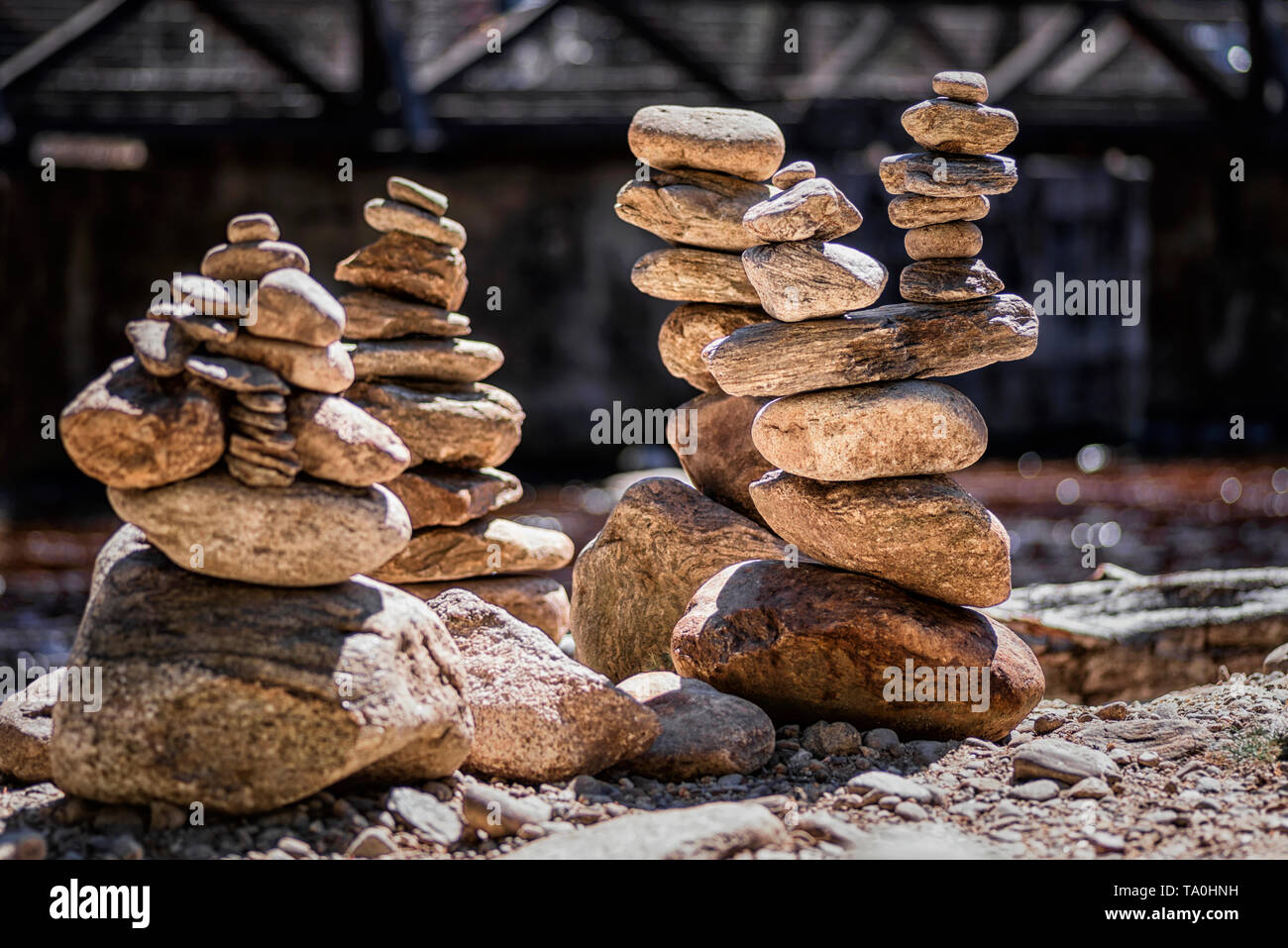 Stones pyramid on pebble beach symbolizing stability, zen, harmony ...
