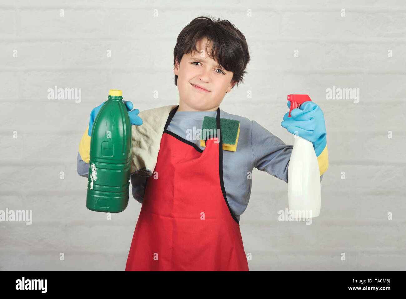 Angry kid cleaning room hi-res stock photography and images - Alamy