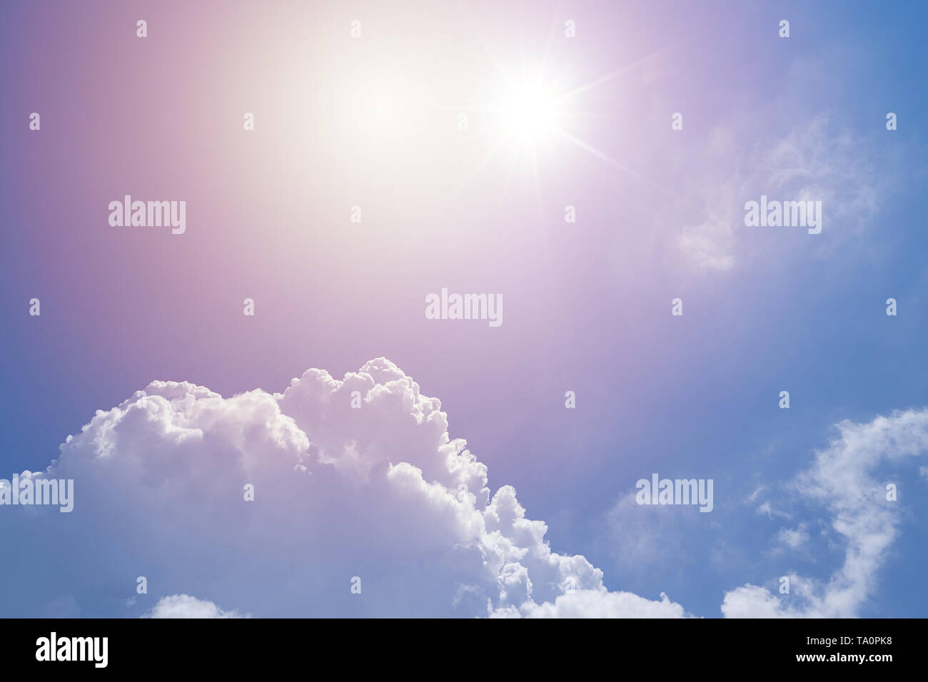 Closeup view of sunlit sky with beautiful cumulus clouds, leak light ...