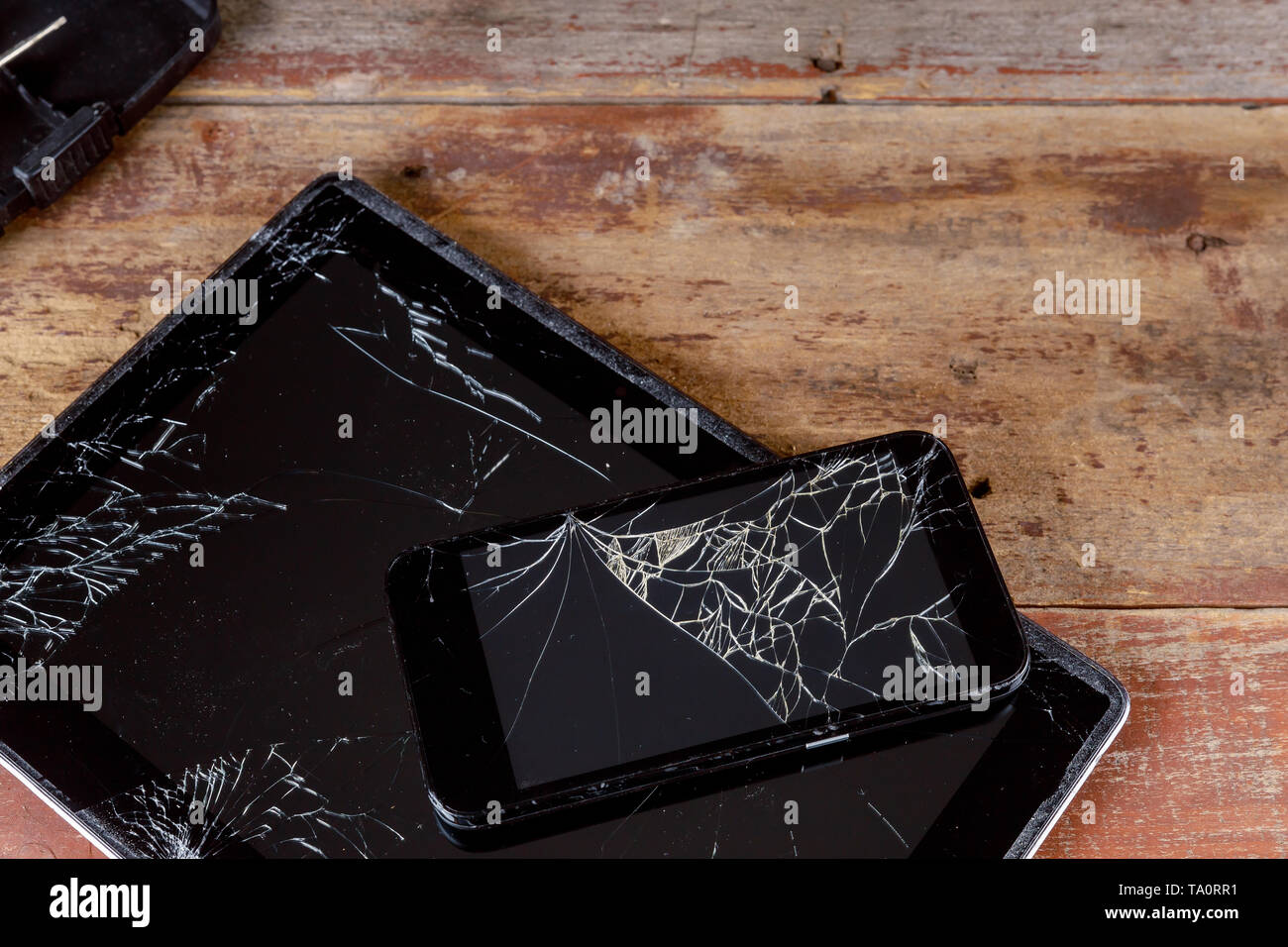 Broken glass screen on the touch screen electronic device smart phone ...