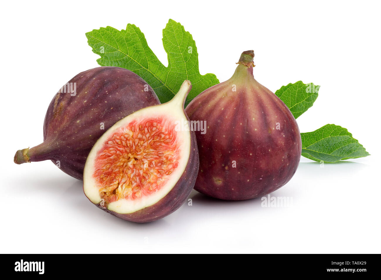 Fresh purple fig fruit and slice with leaf isolated on white background ...