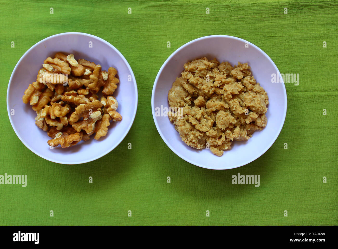 Walnut kernels and their paste Stock Photo - Alamy