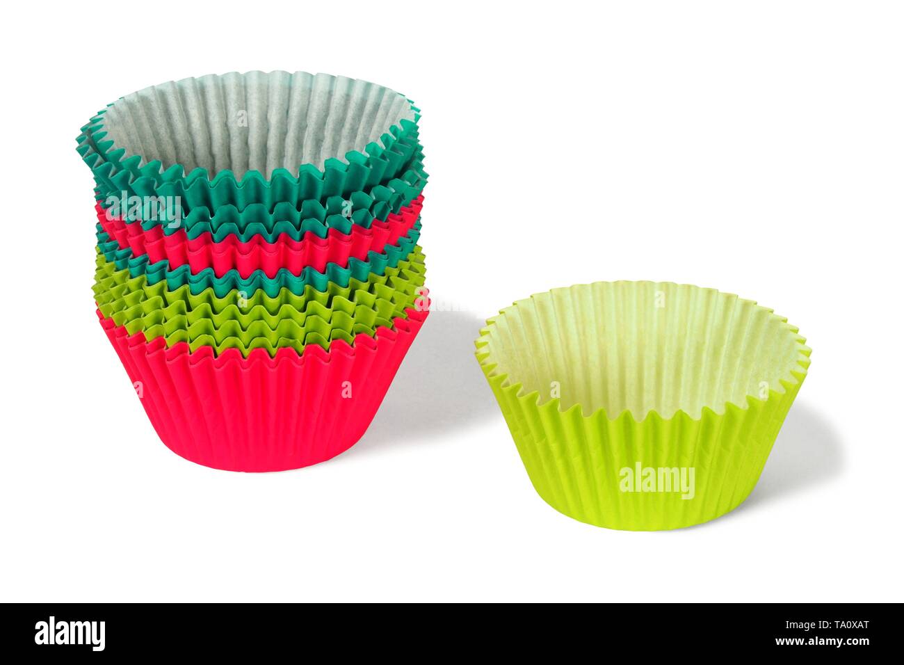 Set of colorful muffin cups on white background Stock Photo - Alamy