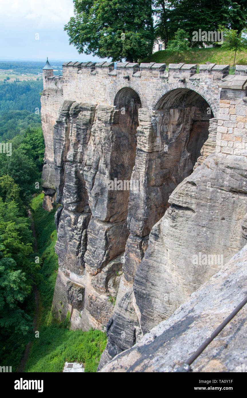 The fortress wall and the tower of an ancient medieval fortress on a ...