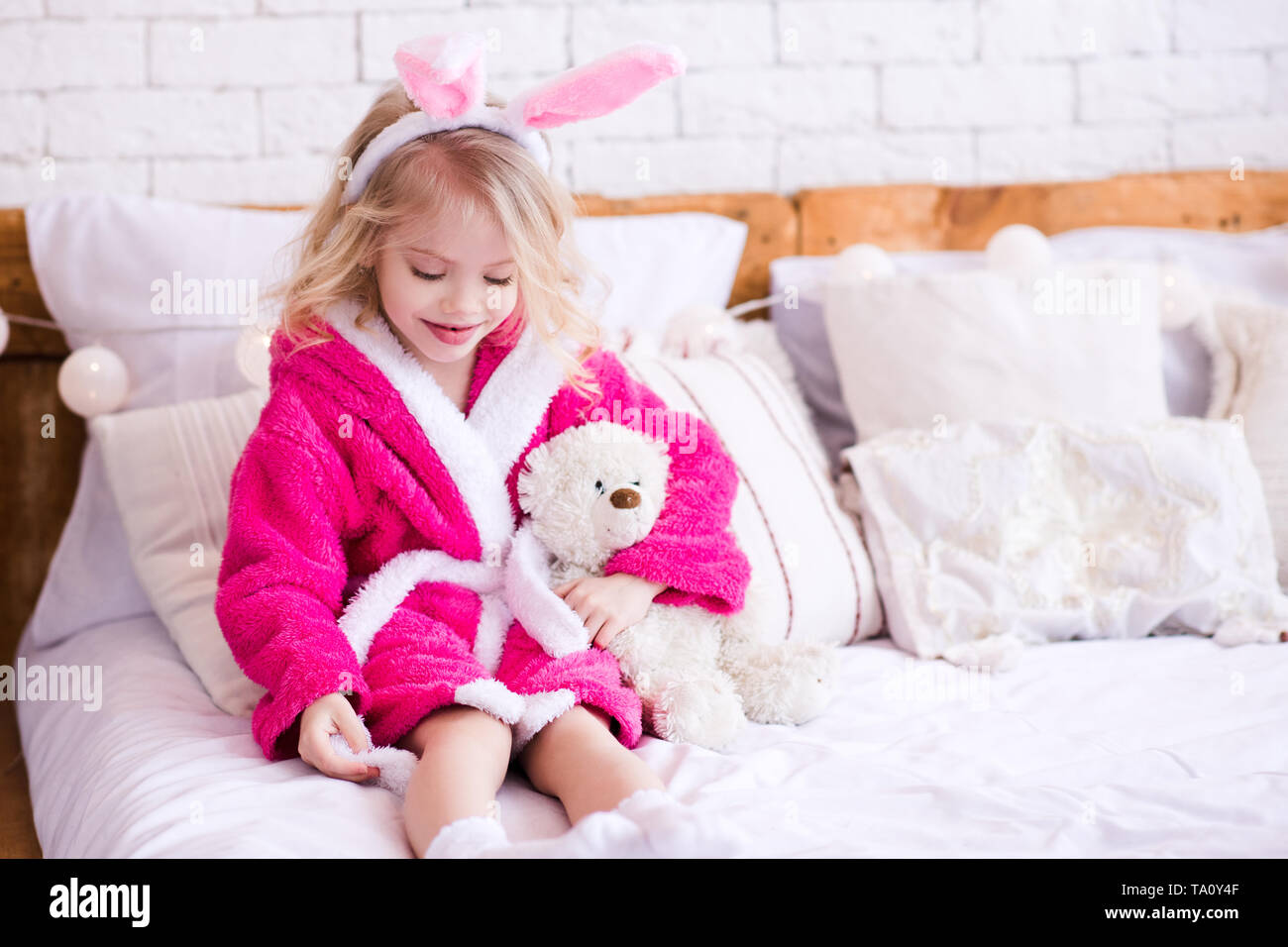 Little girl in her bathrobe hi-res stock photography and images - Alamy