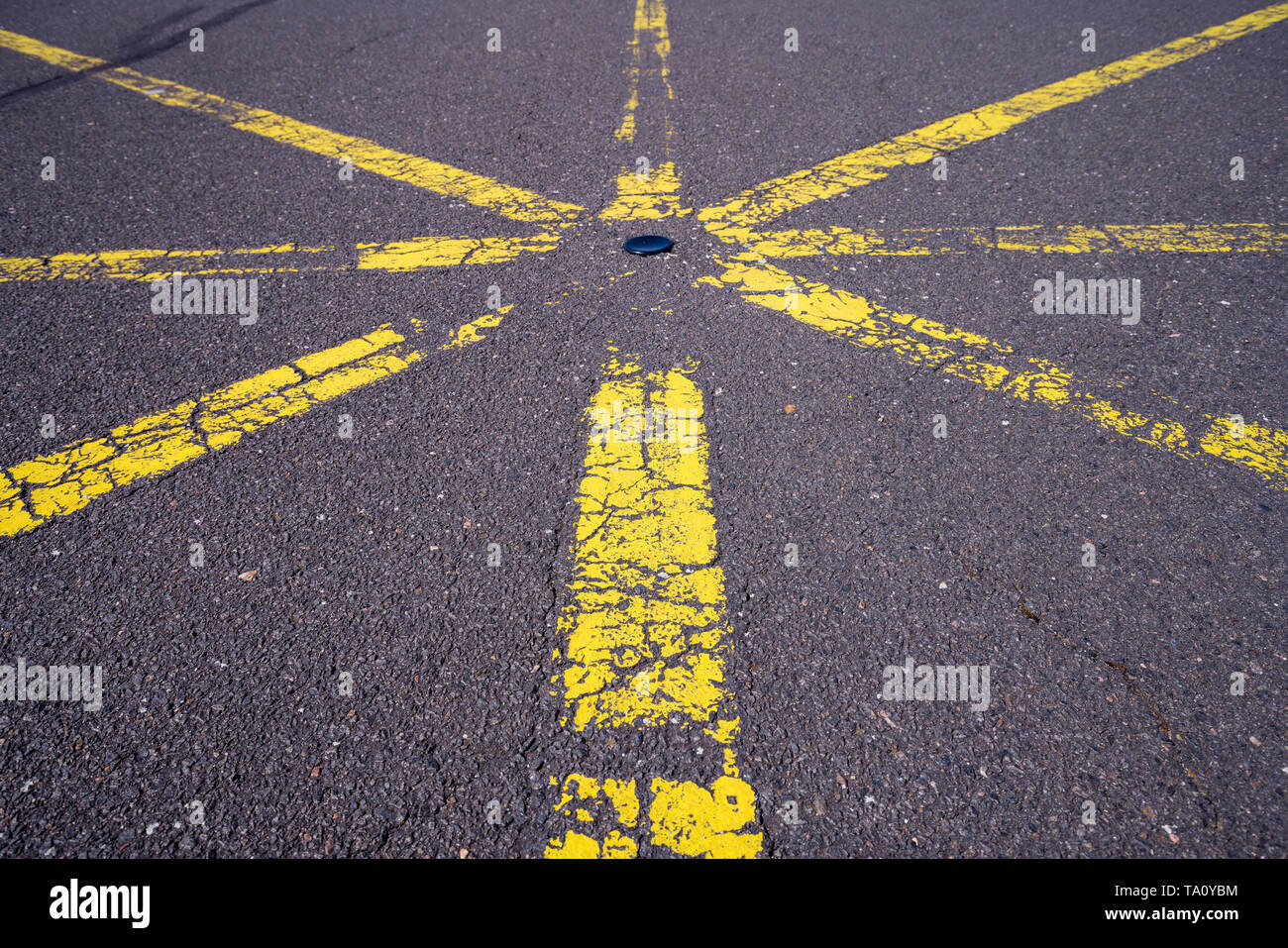 yellow star shaped road marking for backgrounds Stock Photo - Alamy