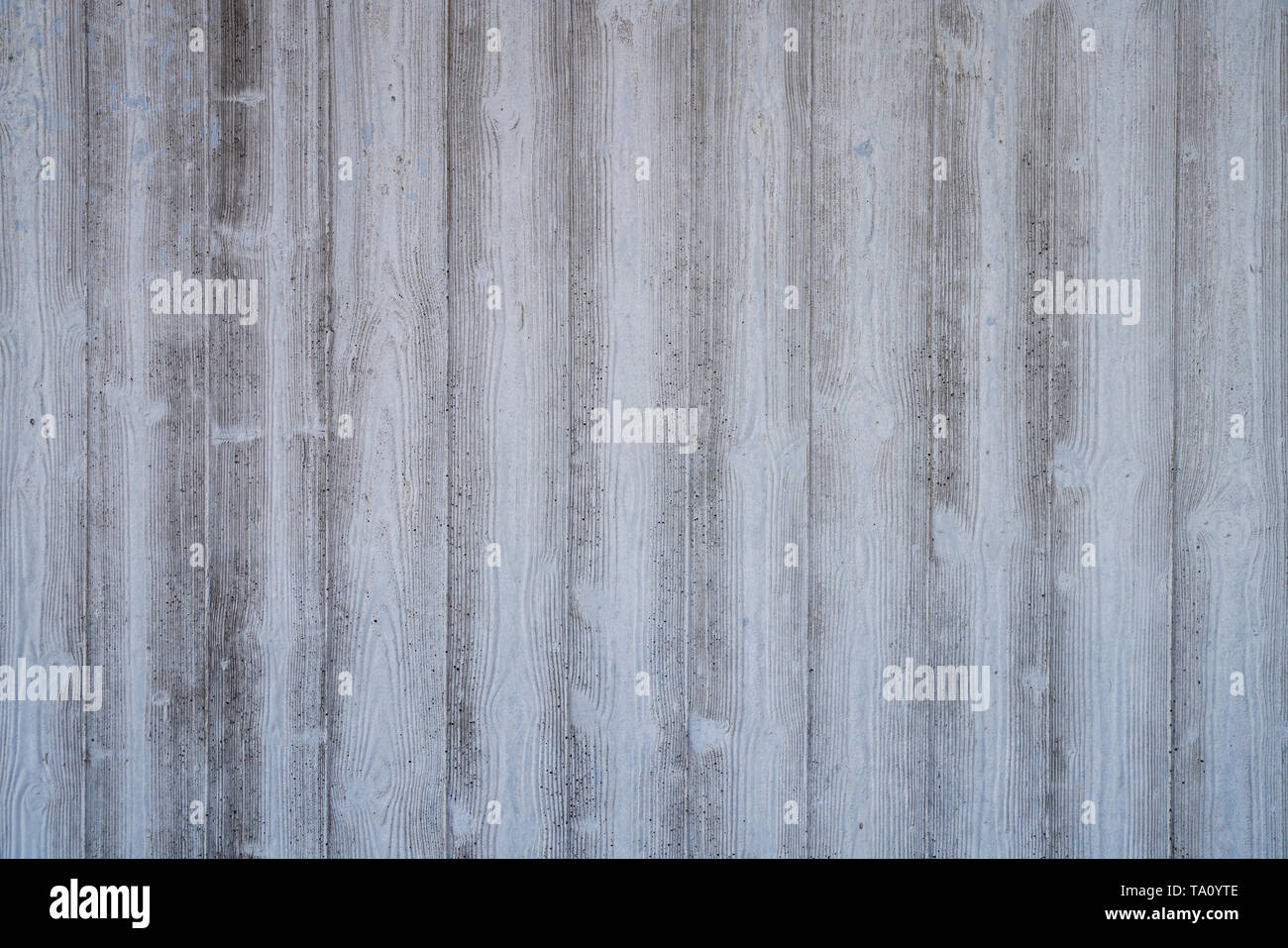 wood grain imprints in a concrete wall for backgrounds Stock Photo - Alamy