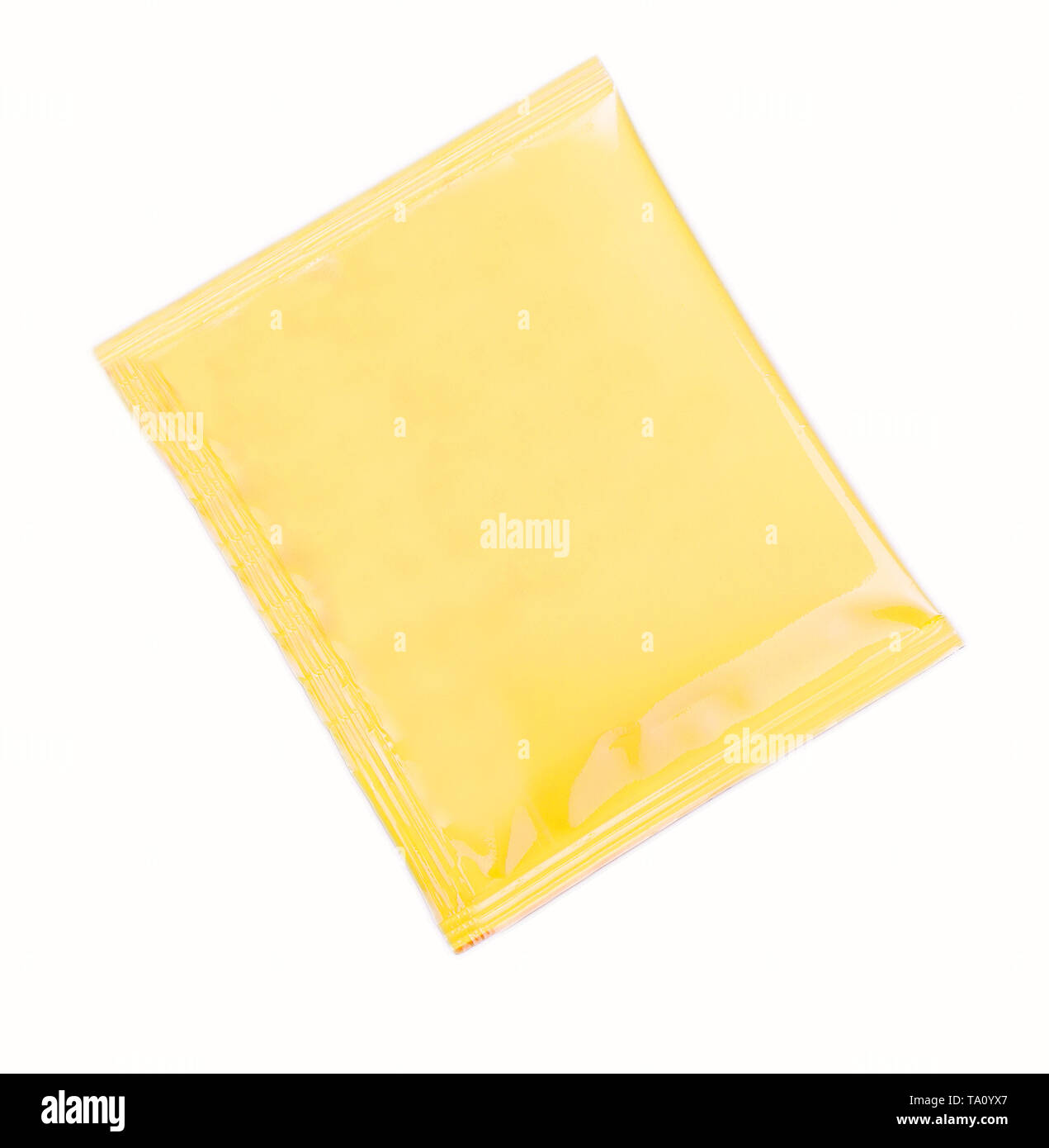 Blank yellow plastic sachet for medicine, drugs, coffee, sugar, salt ...