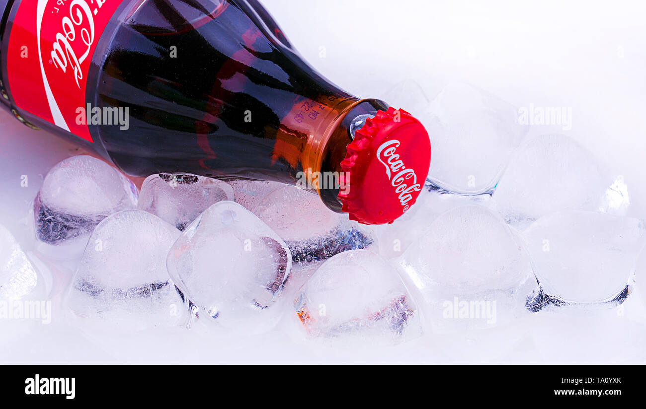 Chisinau, Moldova April - 03, 2017:l Classic Coca-Cola bottle with ice ...