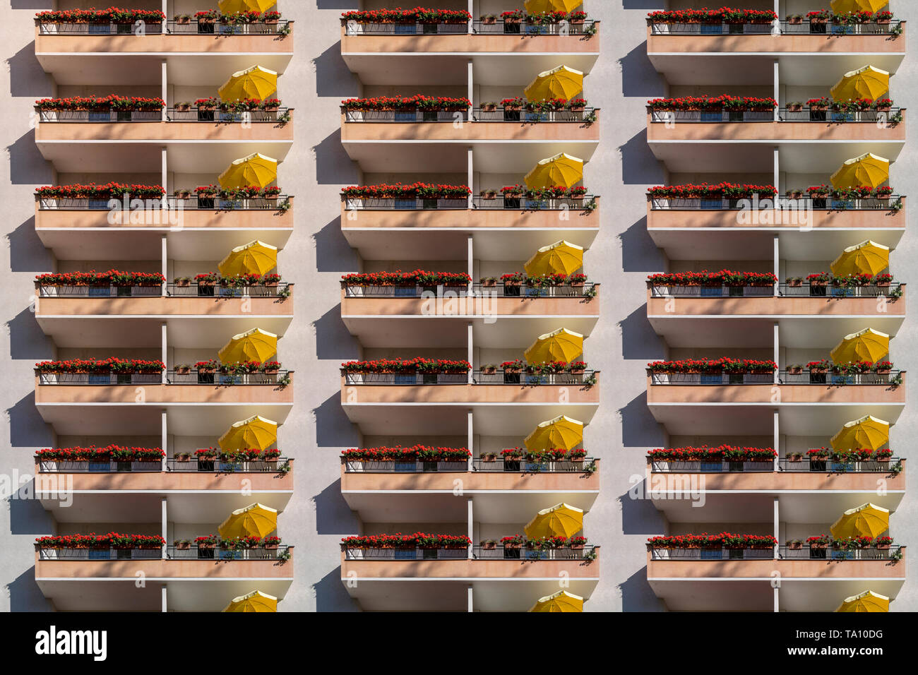 architectural pattern, typical german balconies with yellow parasol and ...