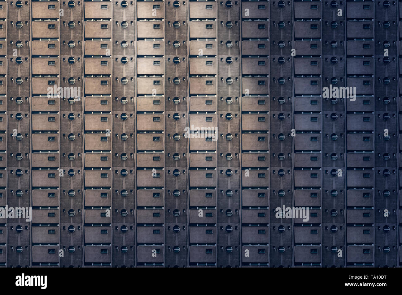 architectural pattern, prison like concrete facade of a miserable house ...