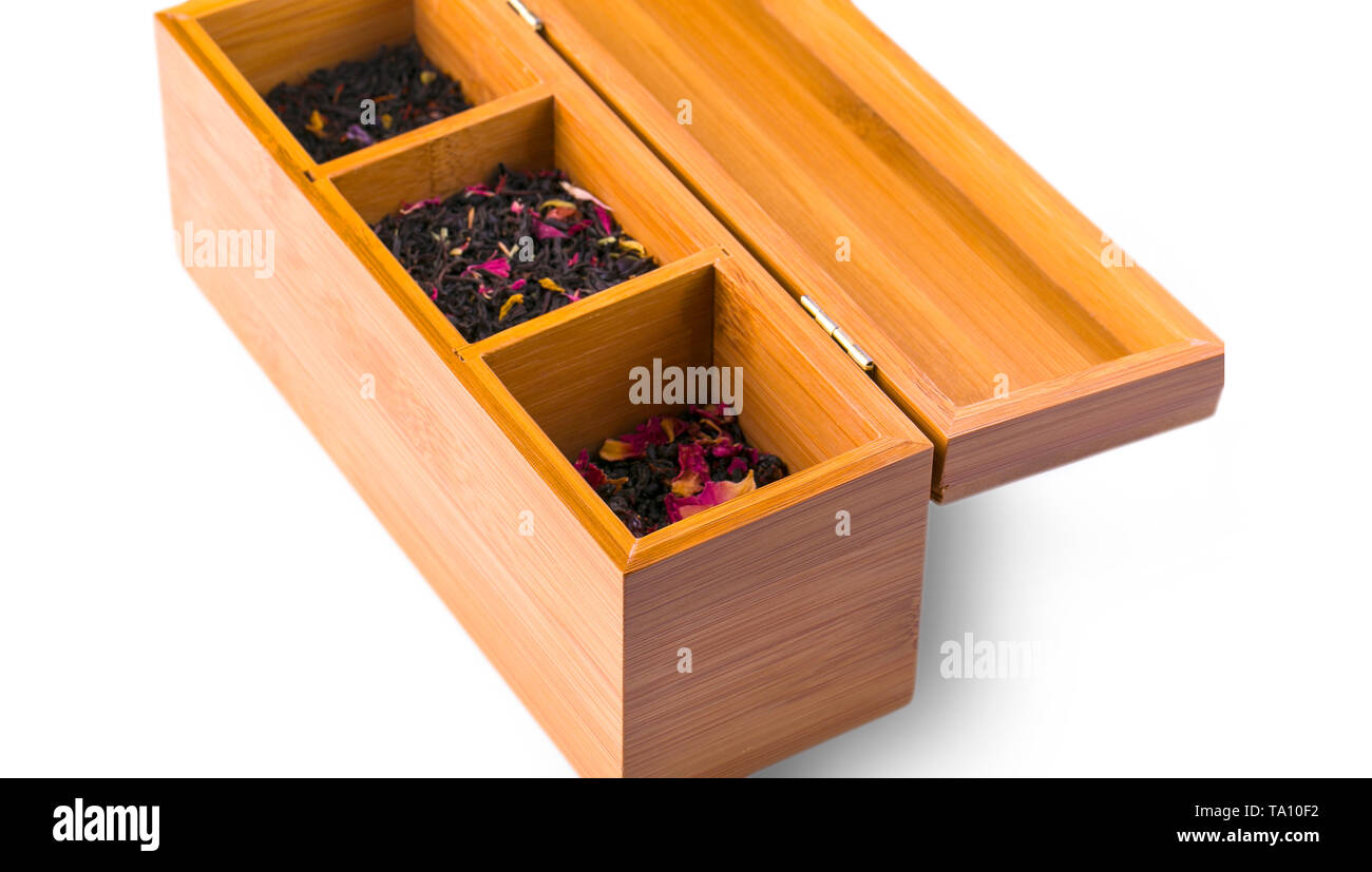 Wooden box with tea on white background Stock Photo - Alamy