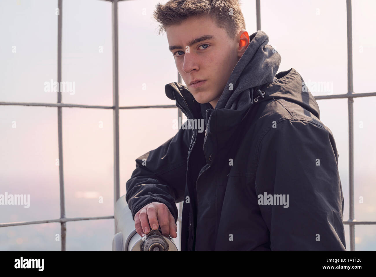 Boy looking tower viewer hi-res stock photography and images - Alamy