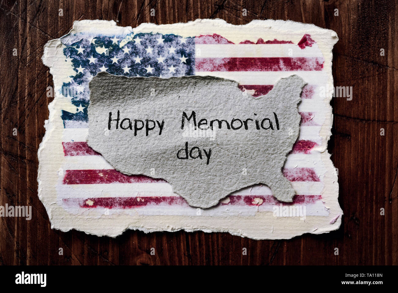 an american flag and the text happy memorial day in a piece of paper in ...