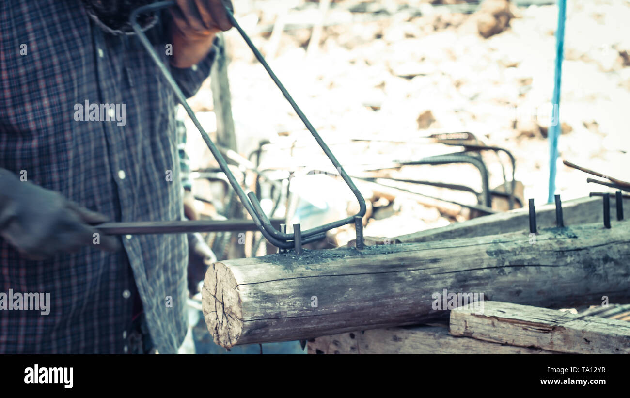 round bar bending steel on construction site for Steel stirrups ...
