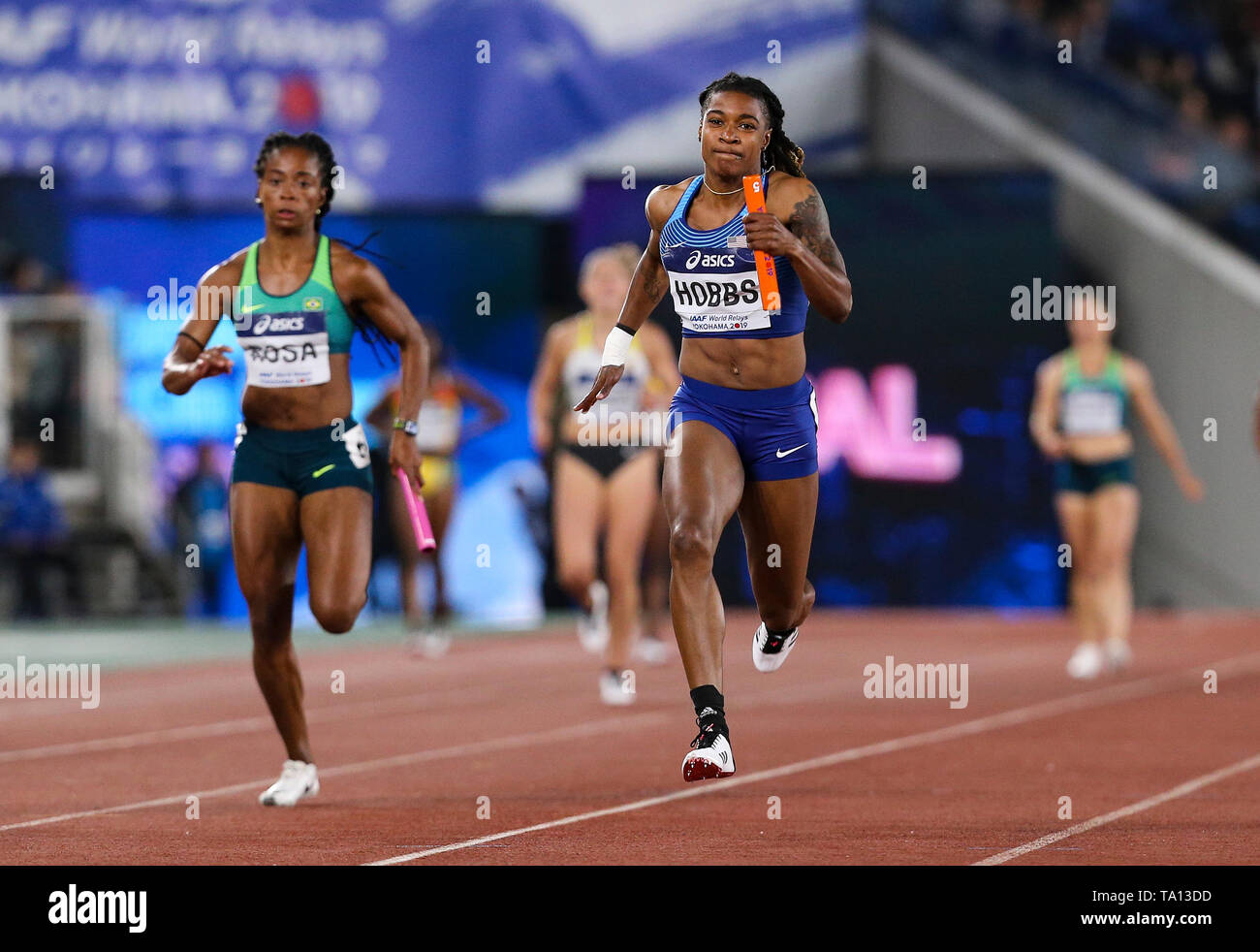 YOKOHAMA, JAPAN - MAY 12: Aleia Hobbs of the USA anchors her team home ...