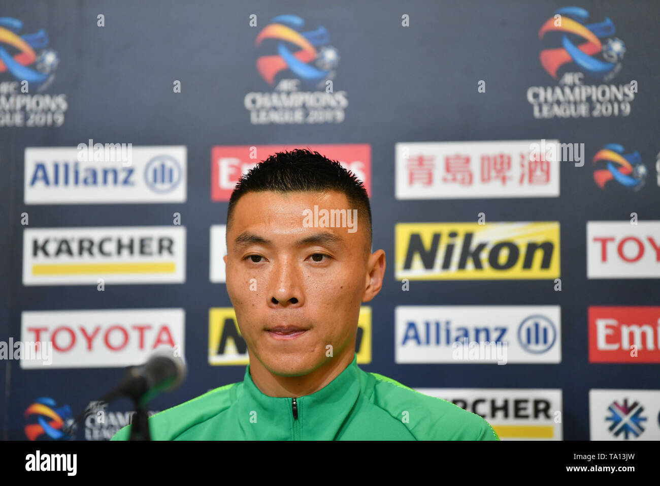 Yu Dabao of China's Beijing Guoan F.C. attends a press conference ...
