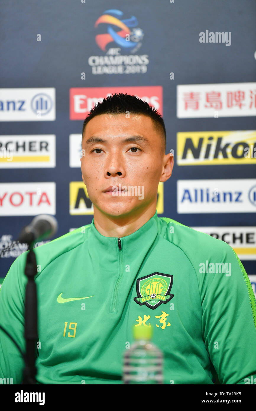 Yu Dabao of China's Beijing Guoan F.C. attends a press conference ...