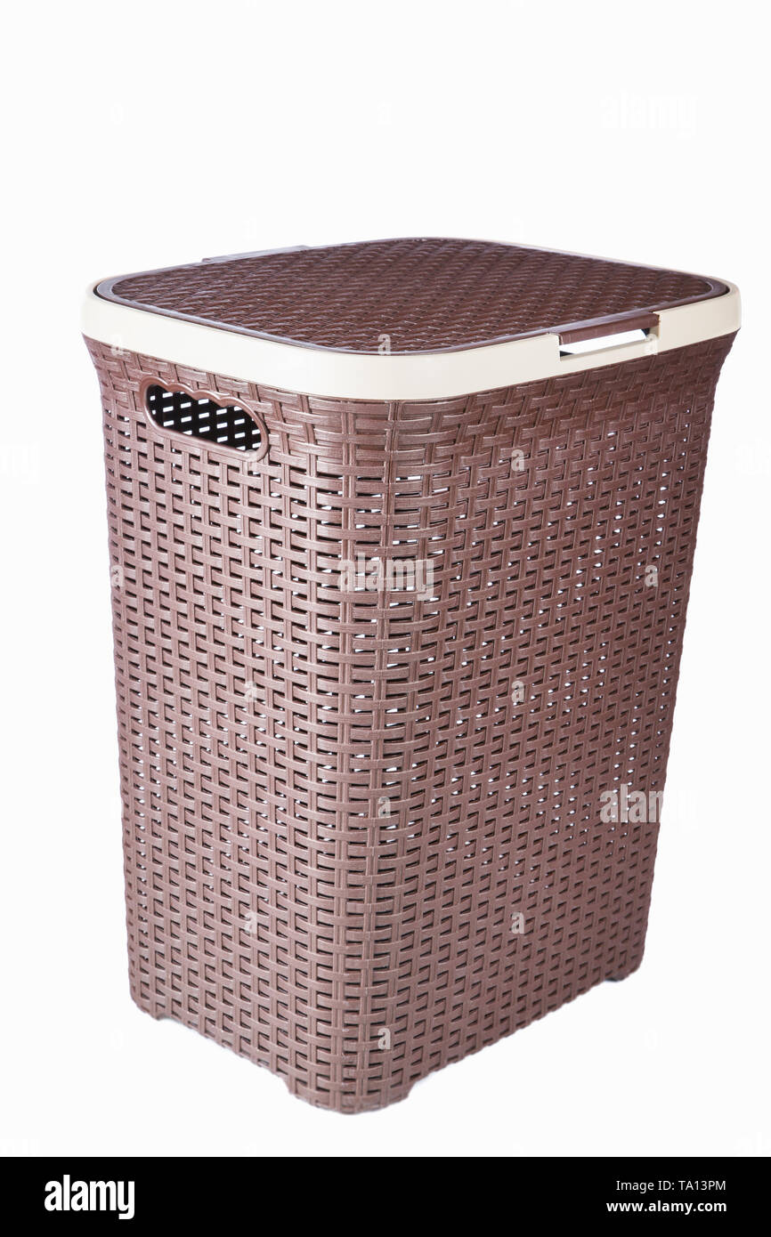 brown laundry basket isolated on a white background Stock Photo - Alamy