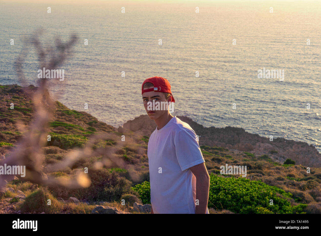 portrait of a young man near the sea Stock Photo - Alamy
