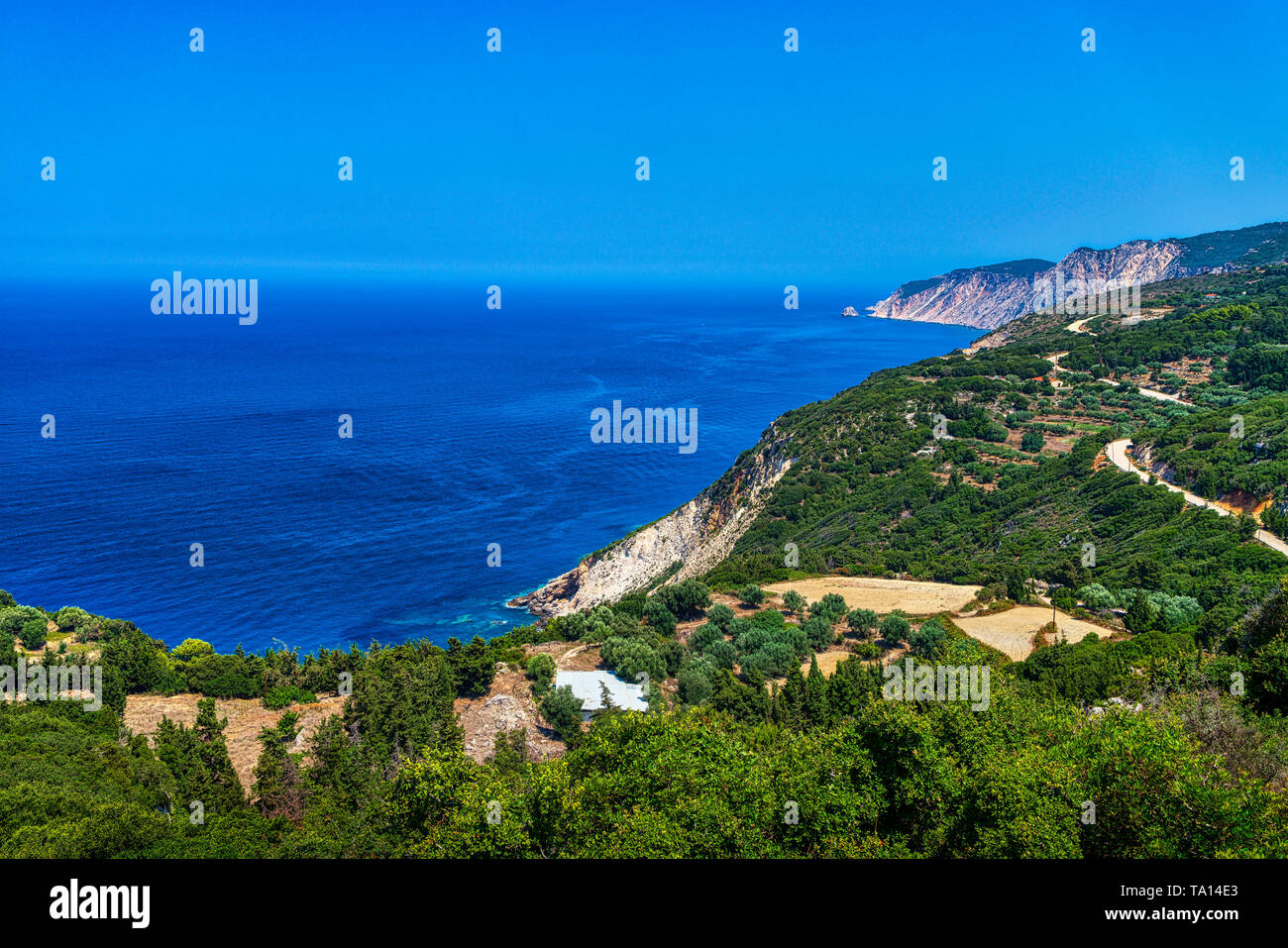 mediterranean shore with blue see and cloudless sky Stock Photo - Alamy