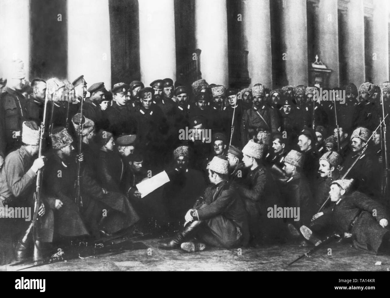An agitation commissioner of the Red Army reads members of a guard ...