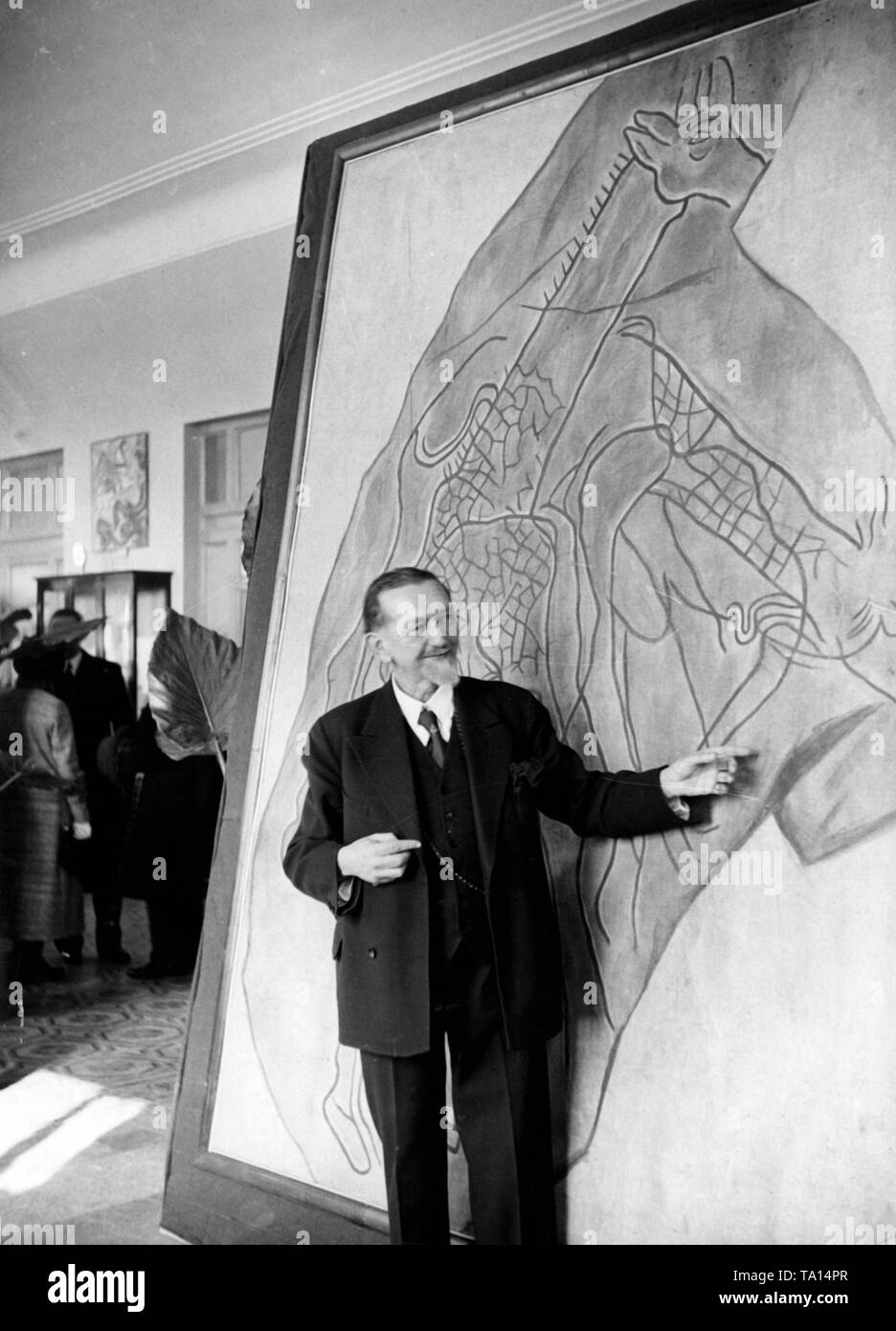 Leo Frobenius explains stone drawings at the opening of his exhibition ...