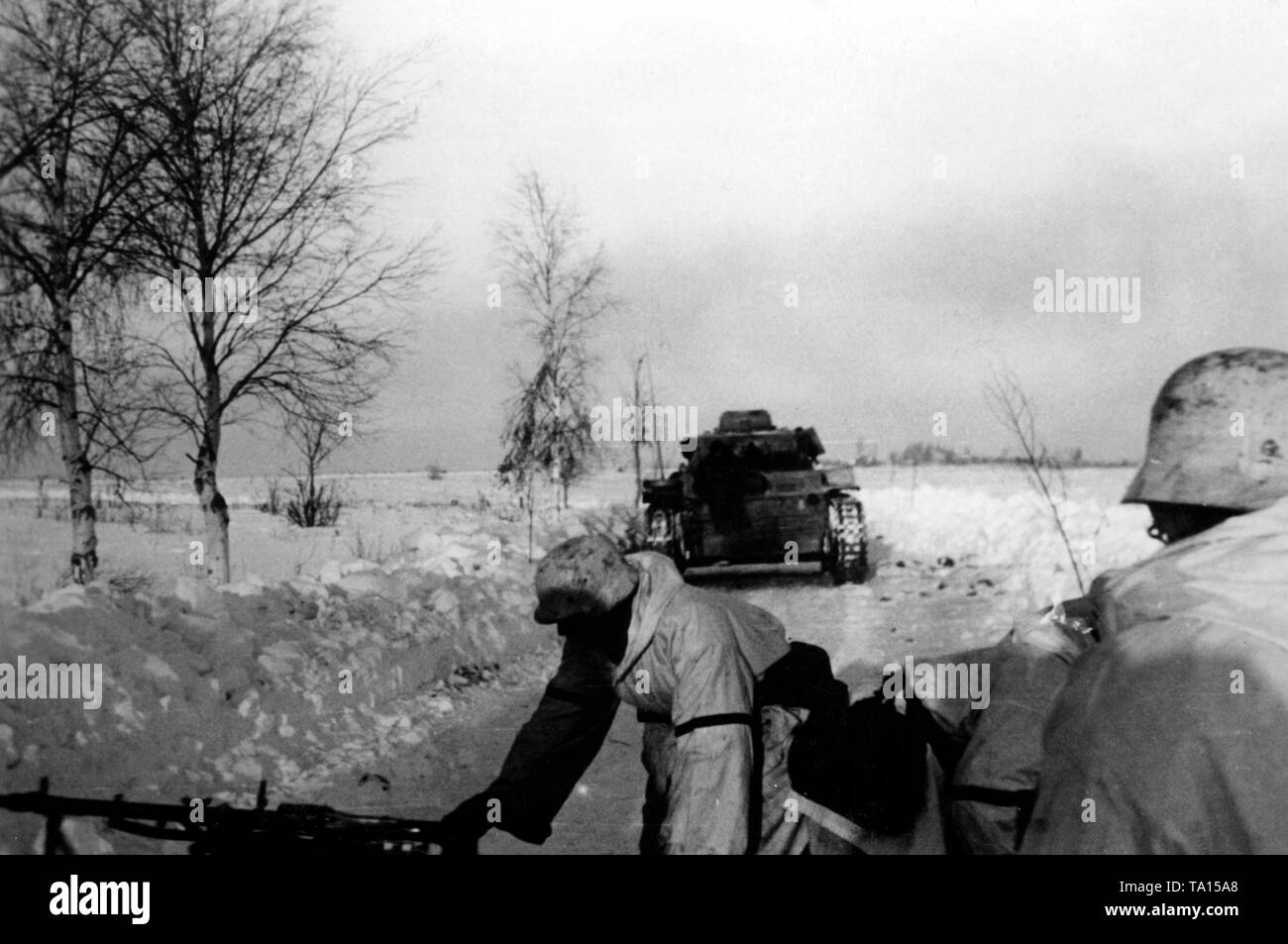 Infantry and a Panzer IV on a field southeast of Lake Ilmen. At the end ...