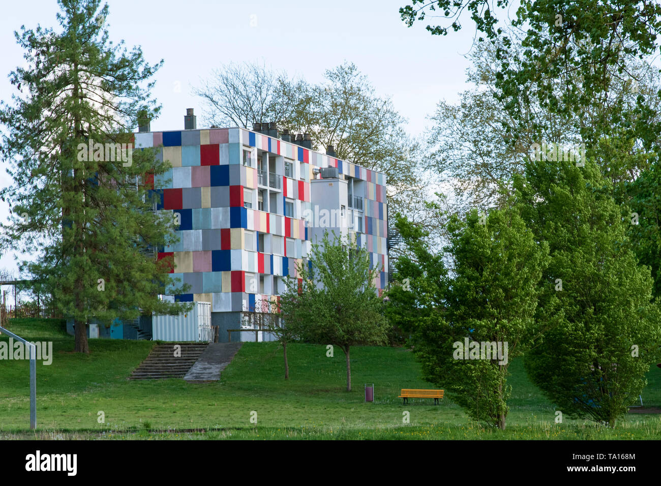 Coloured residential building in nature Stock Photo - Alamy