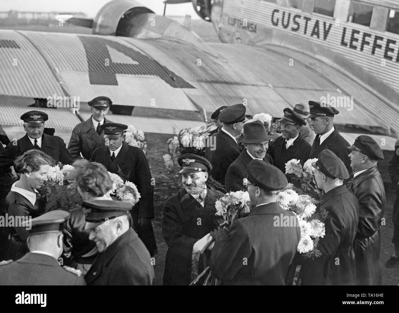 The crew of a Junkers Ju 52 is greeted after a North Atlantic crossing ...