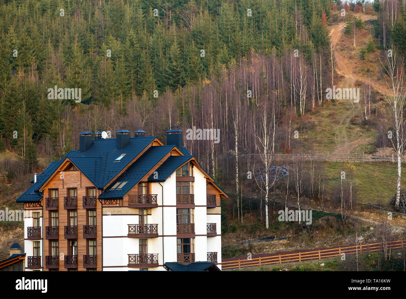 New modern comfortable four-story hotel building with attached premises ...