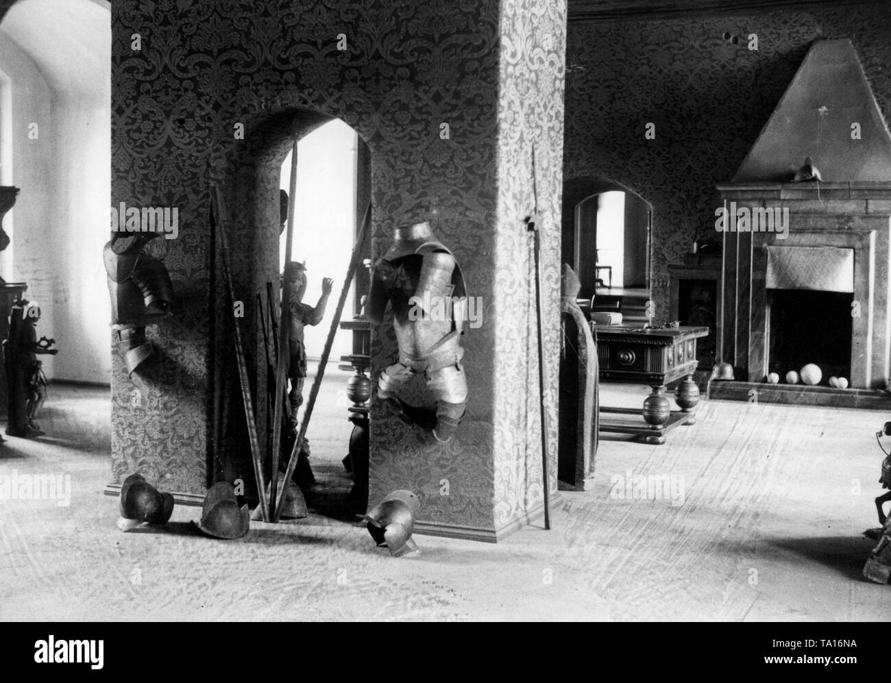 View of armaments, armor and helmets, in the knight's hall of Storkow ...