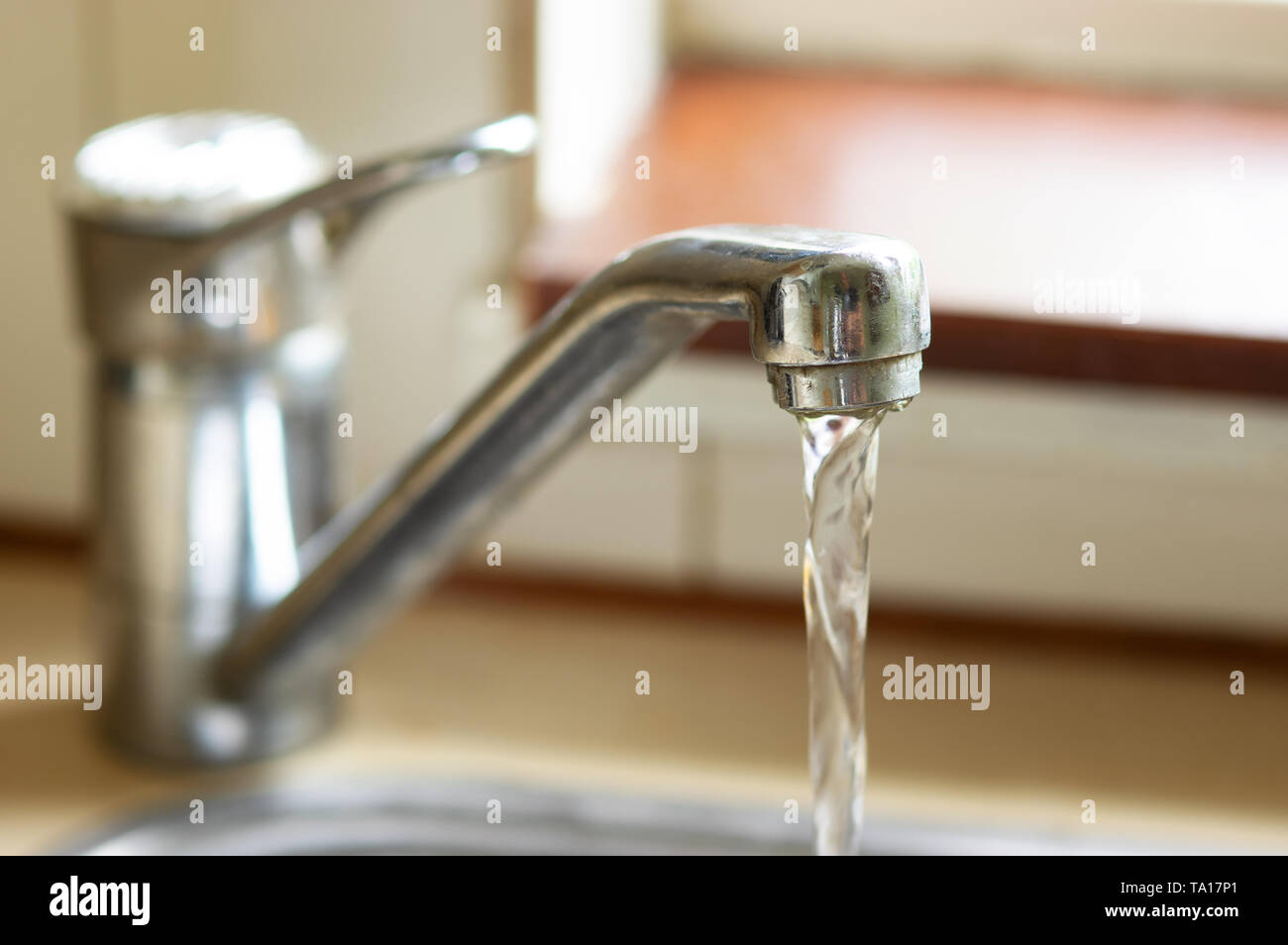 Tap for clean drink water, water flowing Stock Photo - Alamy