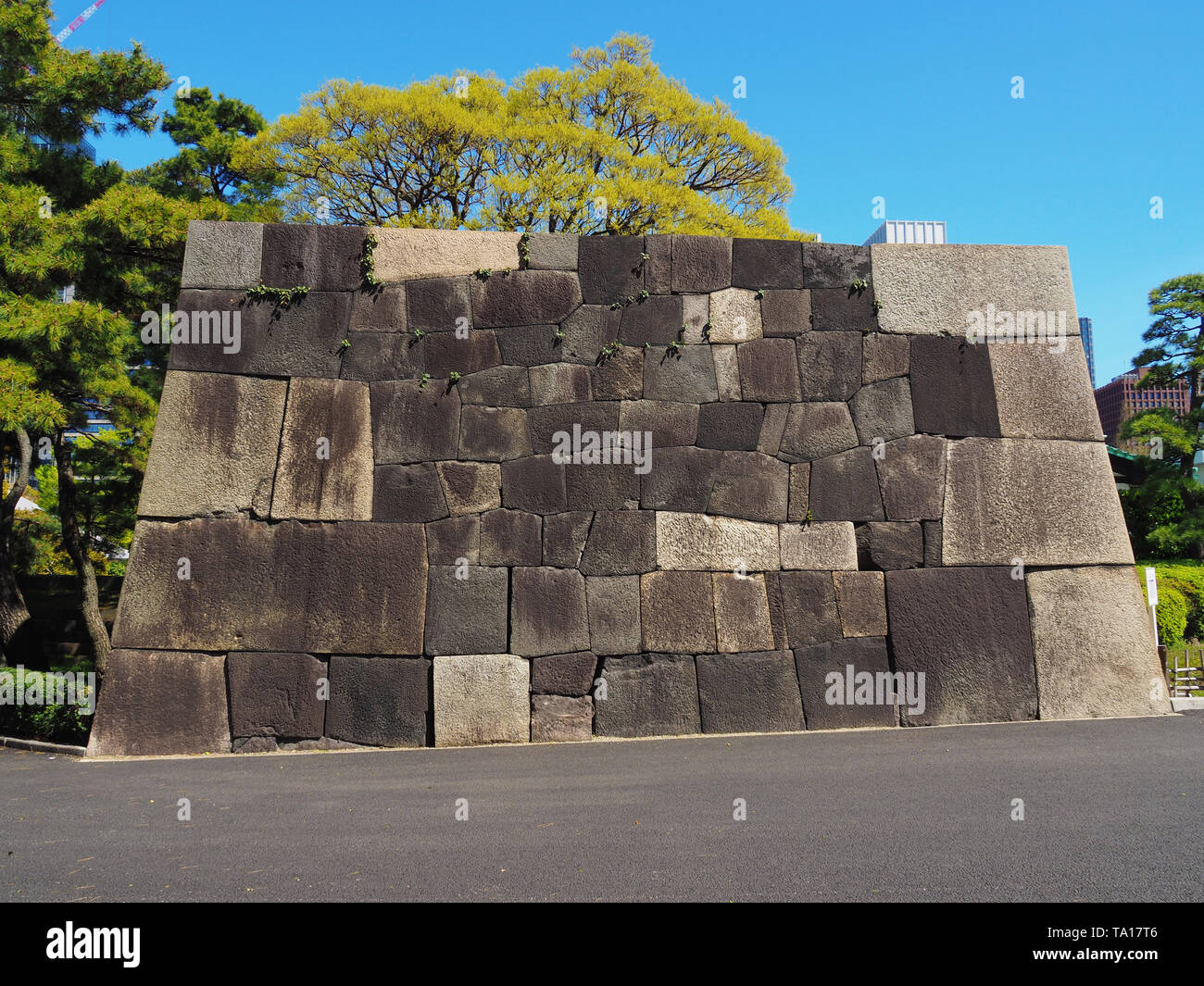 huge stone wall at the entrance of the imperial east garden in tokio ...