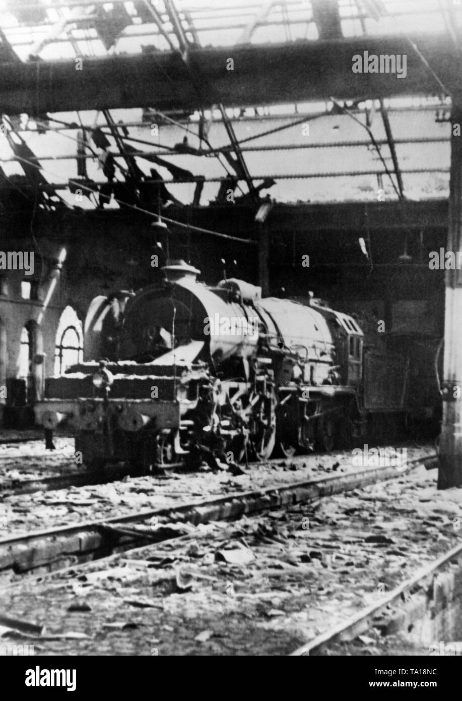 A locomotive in the station of Dinant destroyed by the Luftwaffe in ...