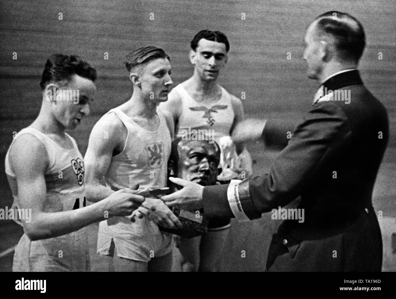 Mallon, Rudolf Harbig and Giesen (from the left) after the 1000m-run at ...